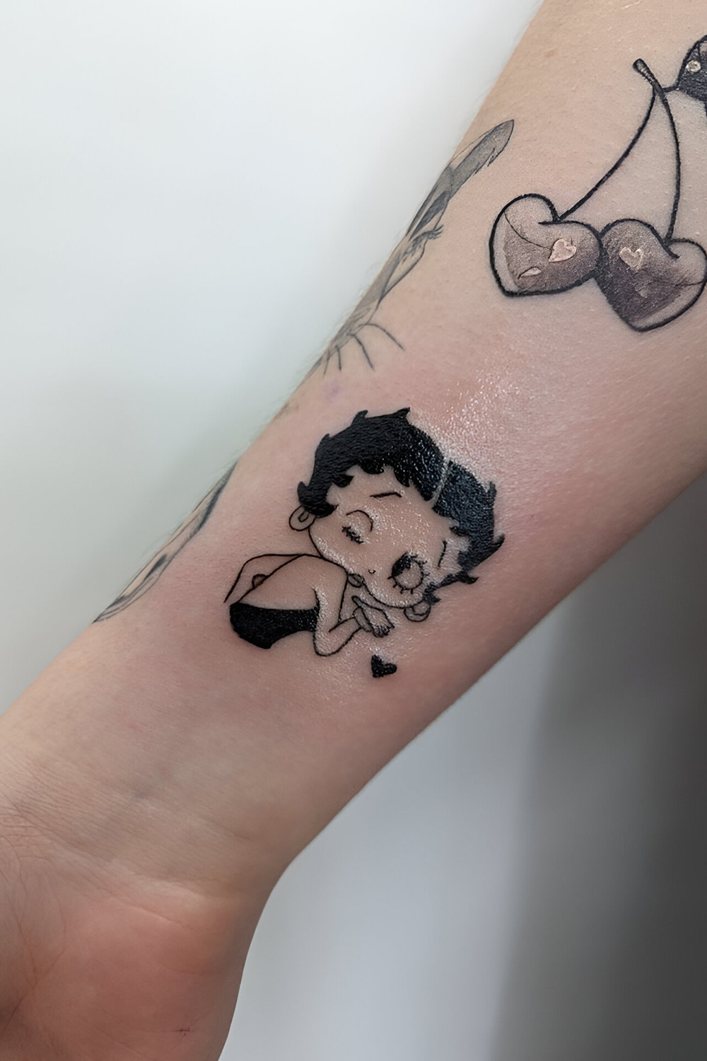 24 Iconic Betty Boop Tattoo Designs for a Touch of Vintage Class